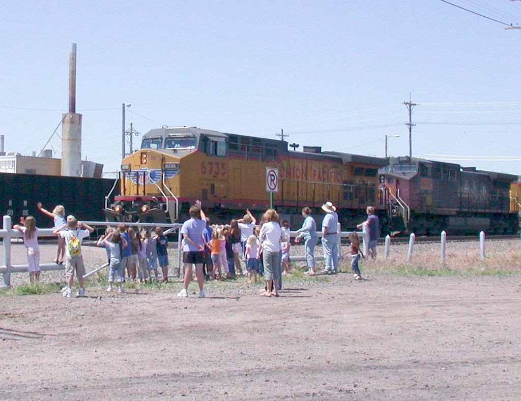 Railfans in training waiting for UP 844